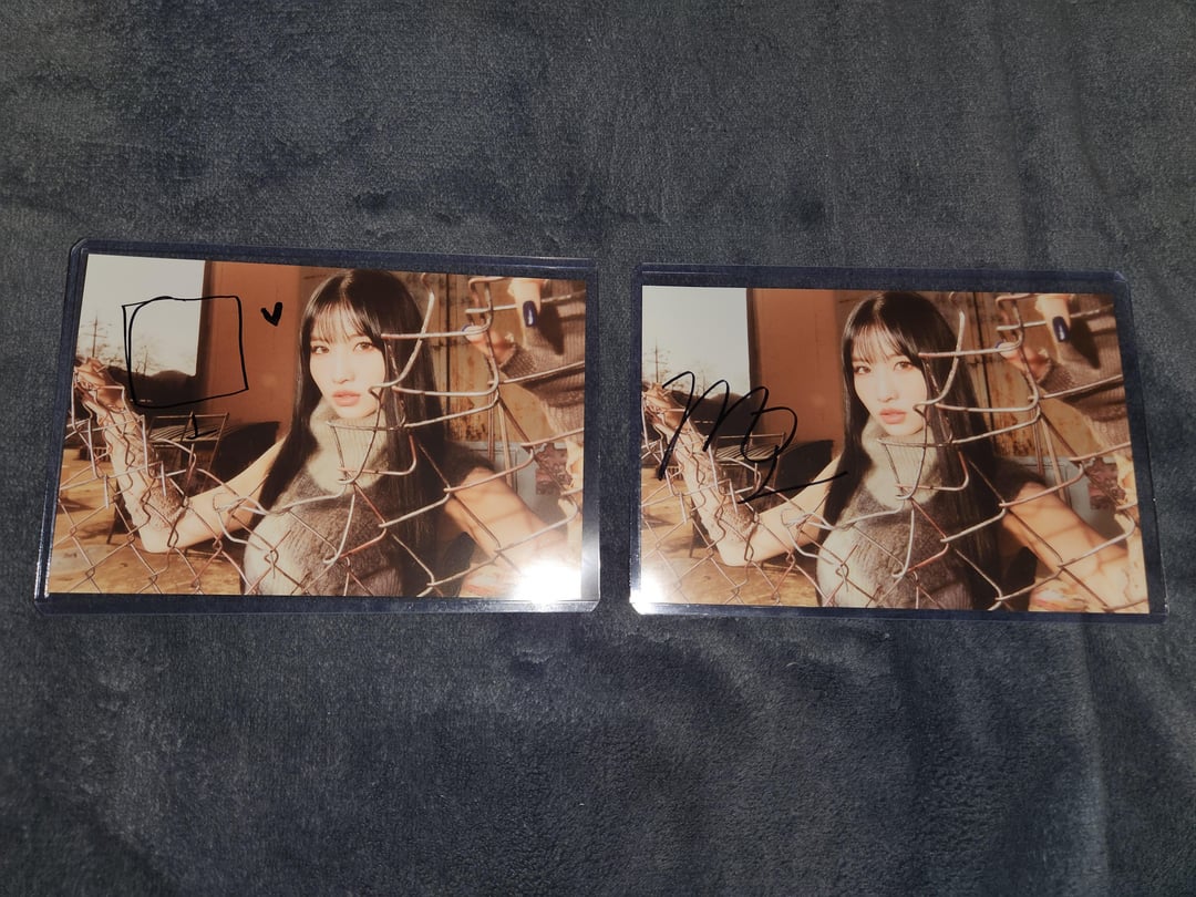 Opened my signed albums today, got both versions of Momo's new ...