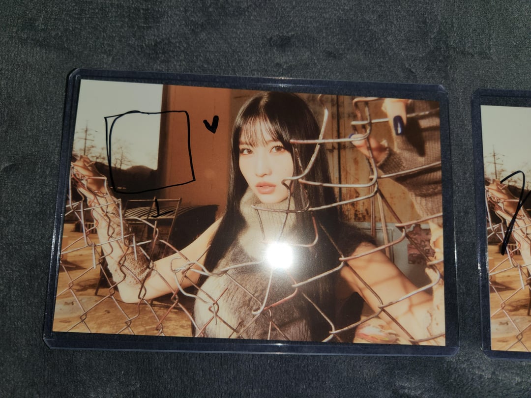 Opened my signed albums today, got both versions of Momo's new ...